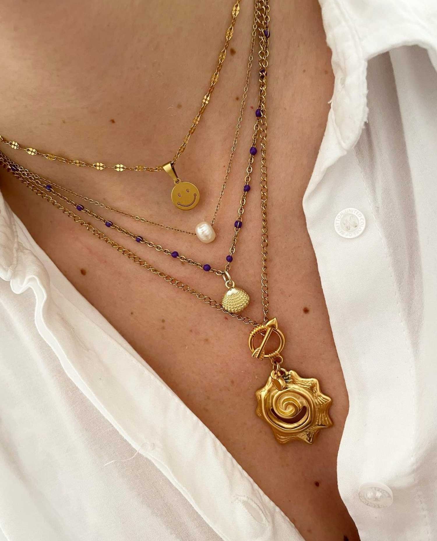 How to Layer Necklaces Like a Pro: Tips & Styling Guide